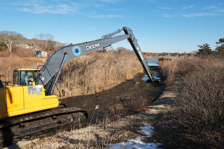 Channel And Harbor Dredging Begins With long reach mechanical excavator ...