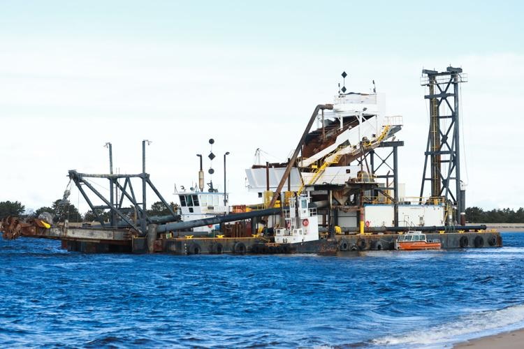 Arrival of 'big boy' dredger shifts sand project into next gear; H&L contracting mobilizes a ...