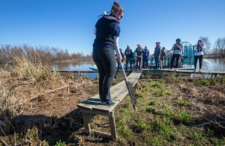In the marsh's muck at a river diversion, Louisiana’s past and future ...