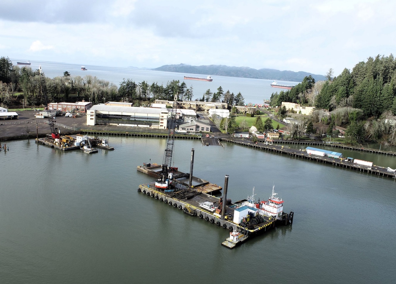 J.E. McAmis crews dredging at FRC (Fast Response Cutter) Homeport ...