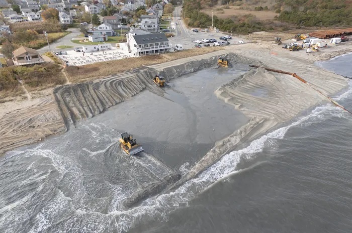 Cape Cod Canal dredging project replenishing sand along Town Neck Beach ...
